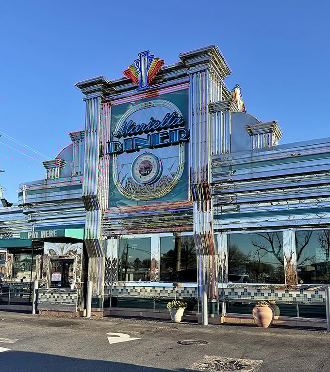 Sunlight dances across the diner's Art Deco fa&ccedil;ade, its neon sign promising the kind of meal that makes you want to hug the chef afterward.