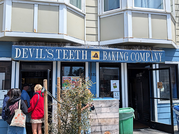 The blue storefront of Devil's Teeth Baking Company stands like a beacon of breakfast hope in San Francisco's foggy Outer Sunset neighborhood.