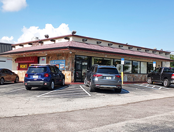 The unassuming exterior of Mom's Place stands like a breakfast beacon on Dale Mabry Highway, promising homestyle comfort that keeps the parking lot perpetually full.