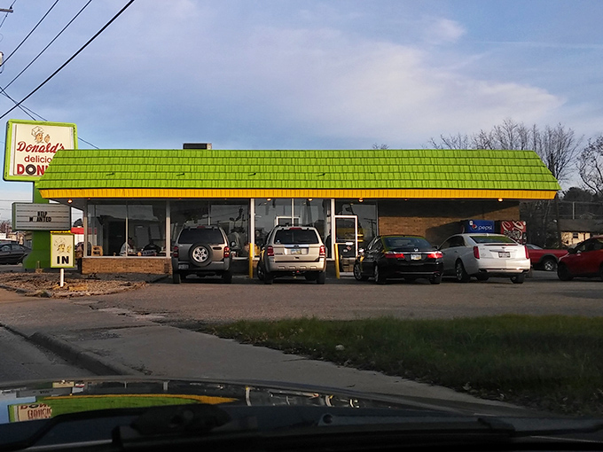 The iconic green-roofed Donald's Donuts stands like a beacon of sweetness in Zanesville, promising delicious treasures inside that have kept locals coming back since 1960.