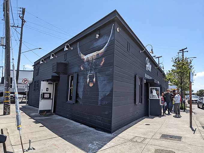 The striking longhorn mural on Horn Barbecue's exterior isn't just decoration&mdash;it's a promise of the primal, smoky delights waiting inside this Oakland treasure.