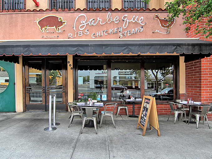The iconic red "BAR-B-Q" sign beckons hungry souls to this South Pasadena treasure like a smoky siren call to carnivores everywhere.