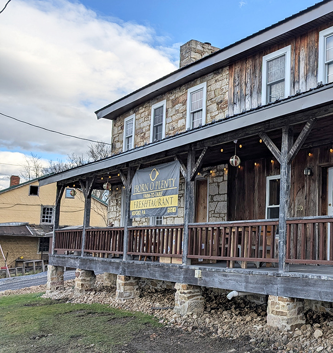 The stone facade of Horn O' Plenty stands like a culinary time capsule, promising farm-to-table delights before you even cross the threshold.
