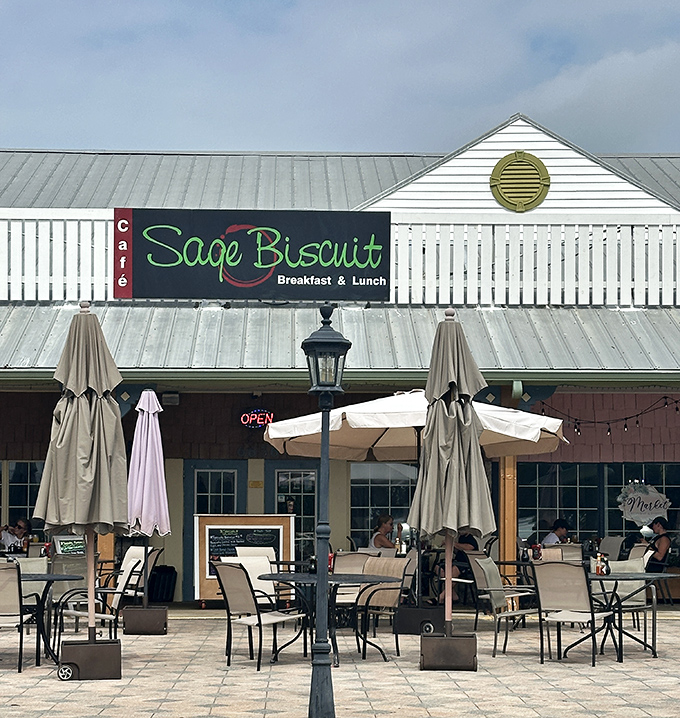 The charming exterior of Sage Biscuit Cafe beckons with its inviting patio seating. Florida sunshine and breakfast classics—what more could you ask for?