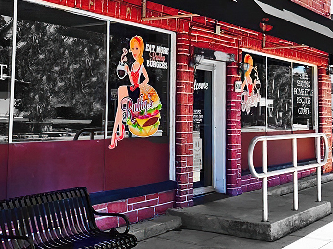 The bright red brick exterior of Ruthy's Kozy Kitchen stands out like a culinary lighthouse, beckoning hungry travelers with its retro charm and promise of home-cooked goodness.