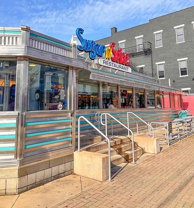 The neon-bright sign of Sugar n' Spice beckons like a colorful lighthouse for hungry souls navigating Cincinnati's breakfast scene.