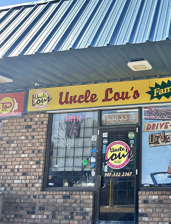 The blue metal roof and brick facade might not scream "culinary destination," but that Sweet Spicy Love logo promises flavor treasures within.