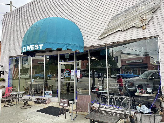 The unassuming storefront with its teal awning and inviting outdoor seating is the culinary equivalent of a secret handshake among North Carolina food lovers.