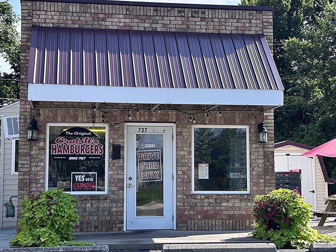 The unassuming brick exterior of Crabill's might not stop traffic, but the burgers inside have been stopping hearts (in the best way) since 1927.