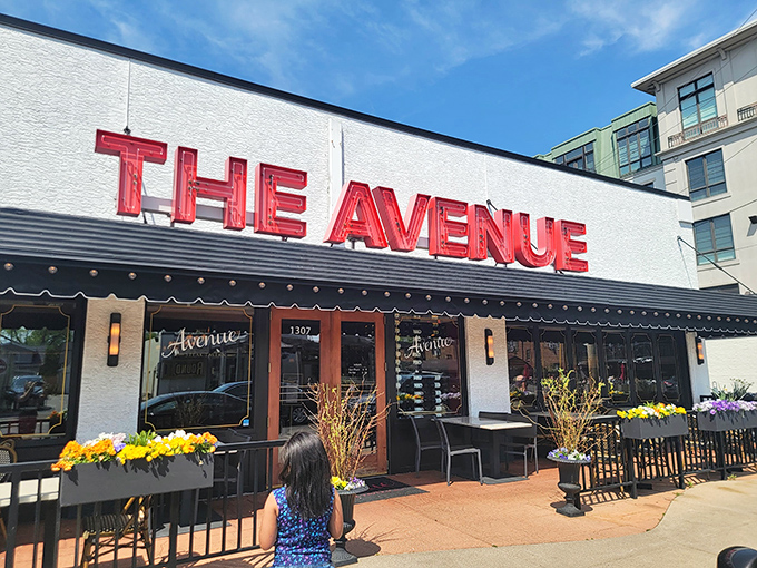 The bold red signage of The Avenue beckons like a lighthouse for the hungry, promising refuge from mediocre meals in Columbus's dining landscape.
