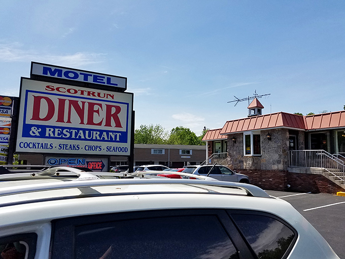The classic roadside sign promises exactly what your soul needs right now: comfort food served with zero pretension and maximum flavor.