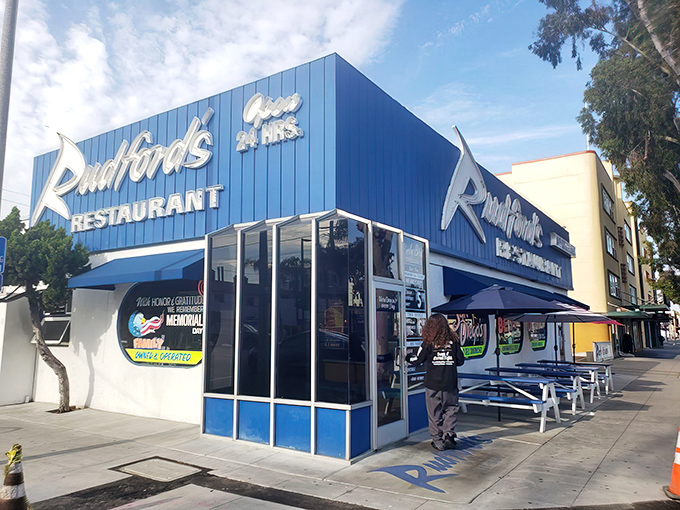 That iconic blue exterior with its retro signage isn't just a restaurant—it's a time machine with pancakes. Welcome to Rudford's.