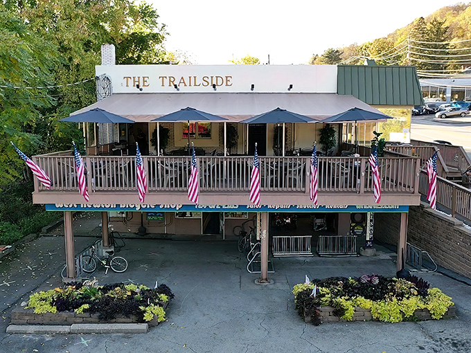 The Trailside stands proudly along the Great Allegheny Passage, its flag-adorned deck practically shouting "Come in, rest those cycling legs, and stay awhile!"