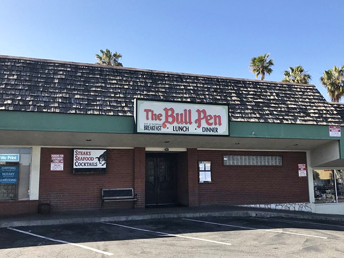 Palm trees frame this unassuming storefront where locals have been finding their happy place for generations.