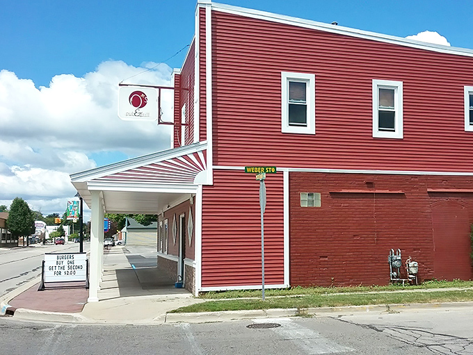 The bright red exterior of O's Pub & Grill stands out in Auburn like a culinary lighthouse guiding hungry travelers to burger paradise.