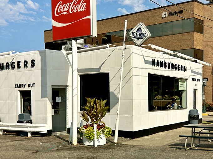 The gleaming white exterior of Hunter House stands like a time capsule from the 1950s, boldly declaring its burger mission to Birmingham.