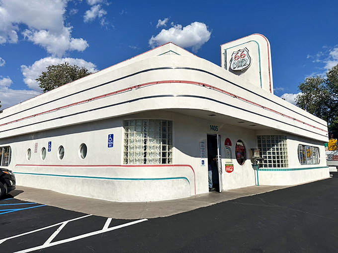 The gleaming white Art Deco exterior of 66 Diner stands like a time machine on Central Avenue, those porthole windows practically winking at passersby.