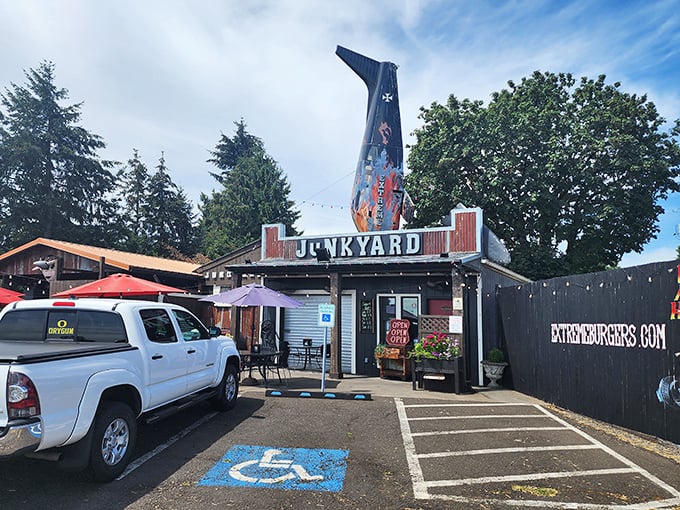 The airplane tail fin jutting from the roof isn't just decoration &ndash; it's your first clue that Junkyard's burgers will send your taste buds soaring.