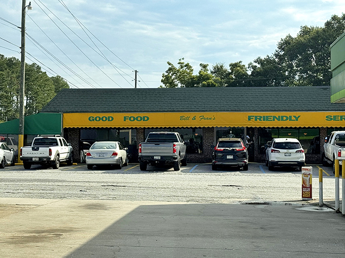 The yellow awning promises exactly what you'll find inside: "GOOD FOOD" and "FRIENDLY SERVICE." No marketing department needed when you've got the basics this right.