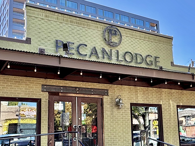A closer look at the Pecan Lodge signage, where countless pilgrims have stood in anticipation of Texas' most hallowed barbecue ritual.