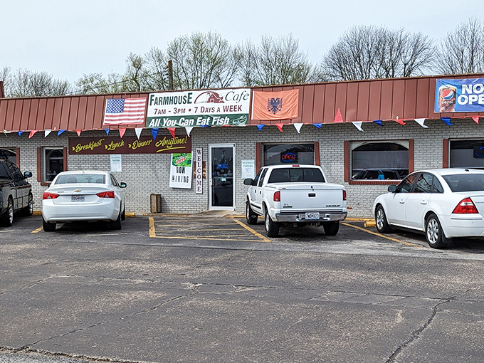 The unassuming exterior of Farm House Cafe stands as proof that culinary treasures often hide in plain sight. That "All You Can Eat Fish" sign is practically daring you to test its limits.