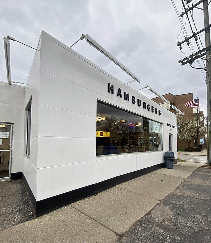 The gleaming white exterior of Hunter House stands like a time capsule on Birmingham's streets&mdash;a burger beacon that's been drawing devotees for generations.