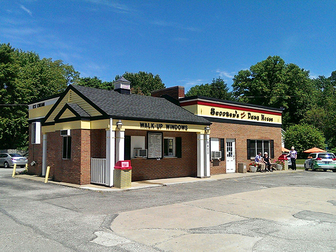 The unassuming brick exterior of Scooter's Dawg House proves once again that culinary treasures often hide in plain sight on ordinary streets.