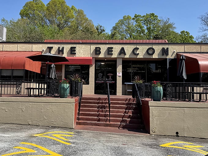 The iconic red awnings of The Beacon beckon hungry travelers like a lighthouse for the famished. Southern comfort food awaits inside.