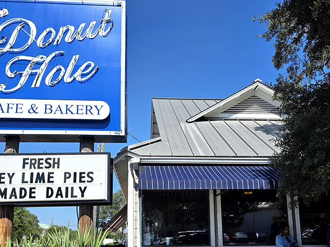 The iconic blue sign beckons like a lighthouse for the hungry. Fresh key lime pies made daily? That's the kind of roadside promise worth investigating.