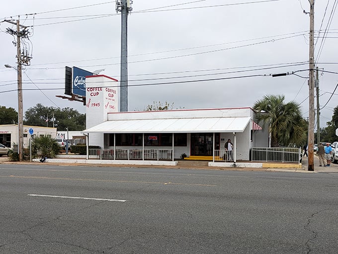 The unassuming exterior of Coffee Cup Restaurant stands as Pensacola's breakfast fortress, where morning magic has been happening since long before Instagram food pics were a thing.
