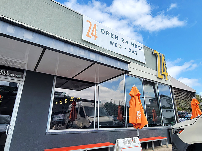 The iconic "24" sign beckons hungry Austinites at all hours. Like a lighthouse for the famished, it promises comfort food when you need it most.