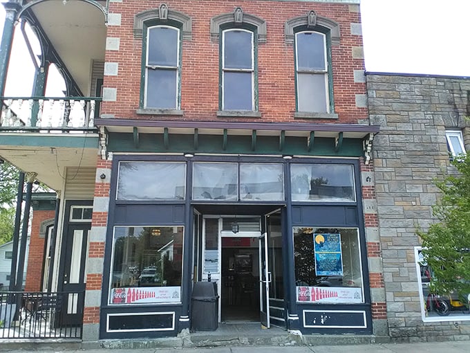 Daylight reveals the charming architectural details of this Edinboro institution, where pizza pilgrims have been making their way for generations.