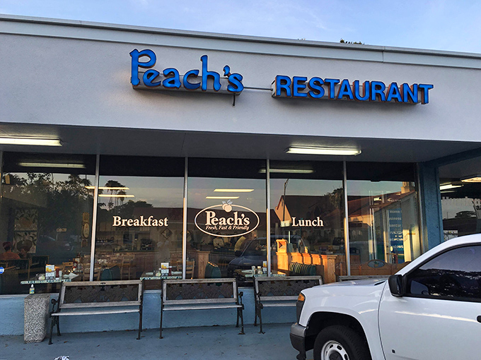 That blue sign beckons like a siren song for anyone who appreciates a proper breakfast done right.