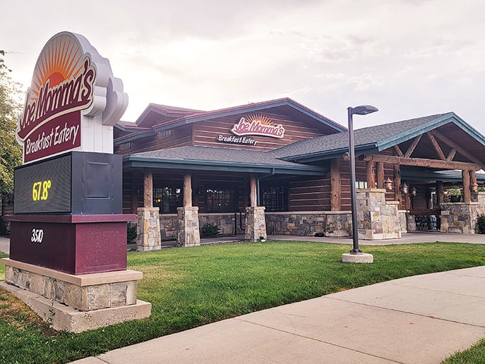 The log cabin exterior of Joe Momma's beckons like a breakfast lighthouse, promising refuge from hunger with its distinctive burgundy sign.