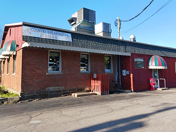 The bright red exterior of Circle Restaurant stands like a culinary lighthouse in Deerfield, promising "Country Breakfast at 6AM" to early risers and breakfast enthusiasts alike.