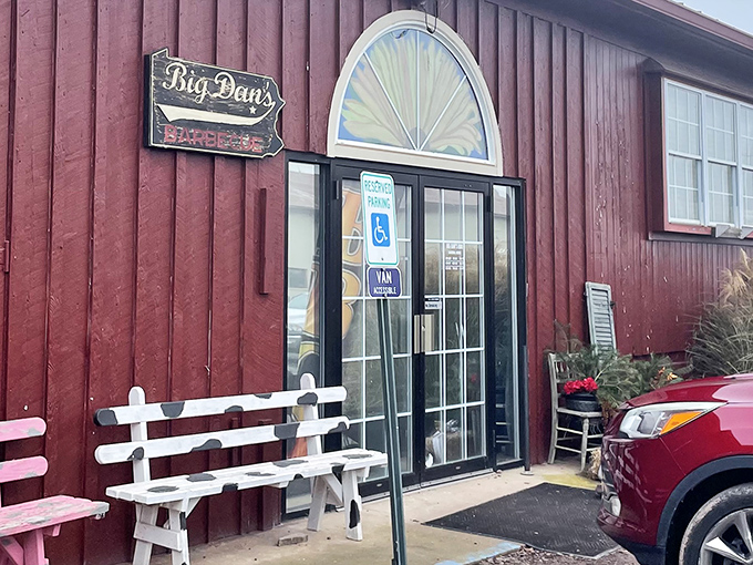 The red barn-like exterior of Big Dan's isn't just charming&mdash;it's a beacon of hope for hungry travelers. Those white benches? They're not decoration; they're for the inevitable wait.