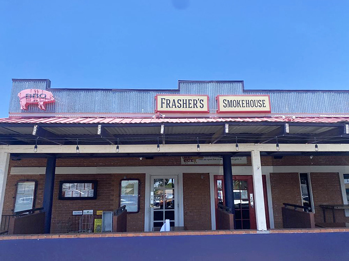The unassuming exterior of Frasher's Smokehouse proves the old adage: the less flashy the BBQ joint, the more serious the smoke inside.
