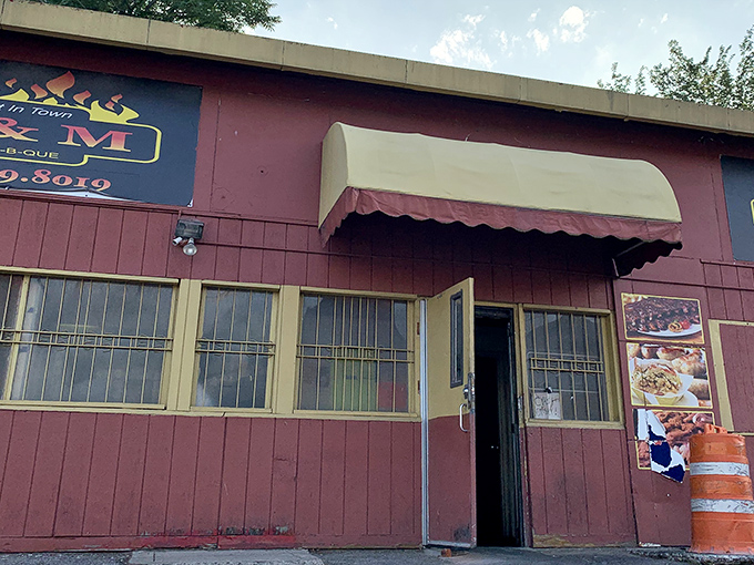 The unassuming burgundy exterior of B & M might not win architectural awards, but that smoky aroma wafting from inside? Pure Cleveland gold.