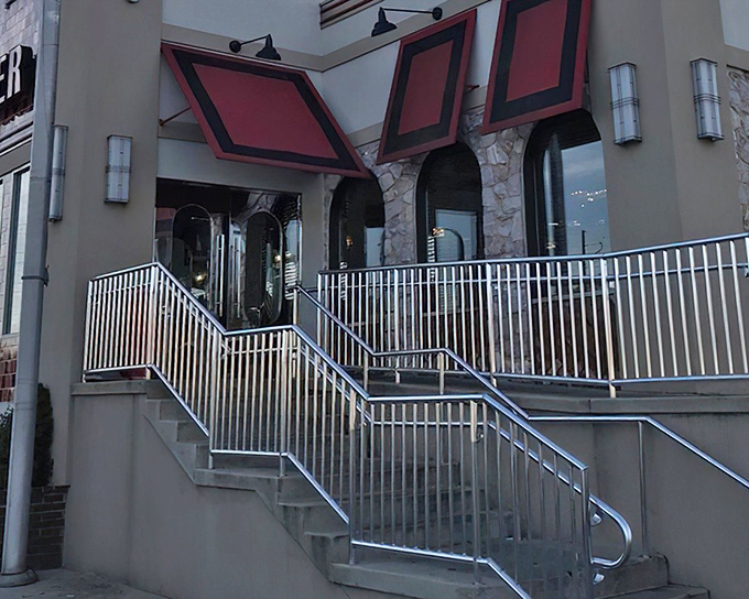 The iconic red-trimmed entrance to New Empire Diner welcomes hungry visitors with a promise of comfort food that transcends the ordinary.