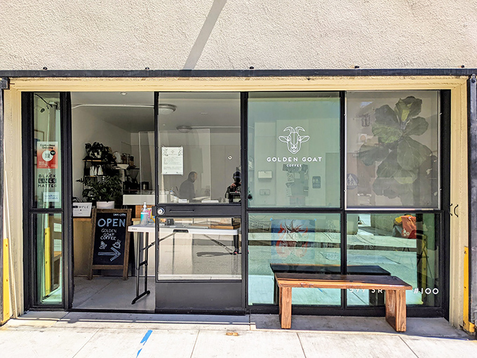 The unassuming storefront belies the treasures within&mdash;minimalist design with that distinctive goat logo promising caffeinated delights ahead.