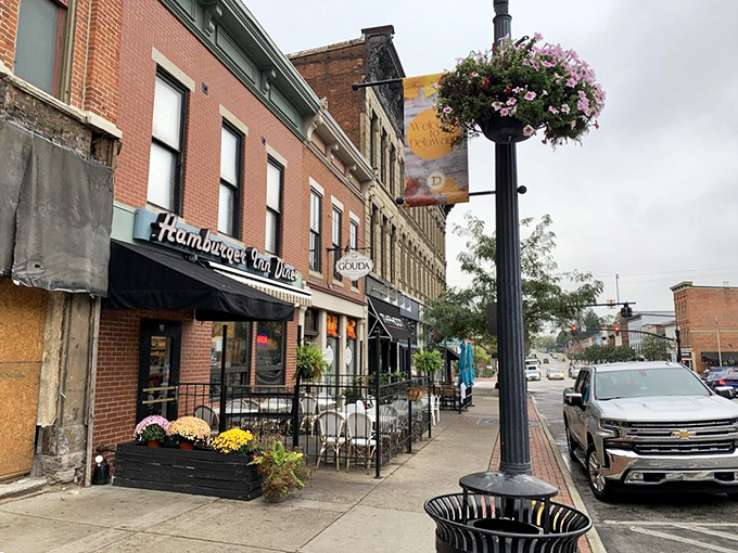 The unassuming storefront of Hamburger Inn Diner on Sandusky Street, where culinary treasures await behind that classic black awning.