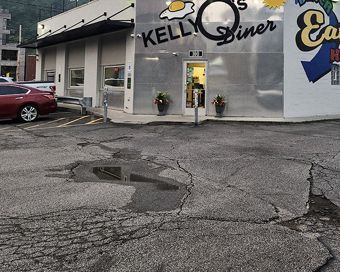 The silver facade of Kelly O's gleams like a beacon for breakfast pilgrims, complete with that iconic sunny-side-up egg logo promising morning salvation.