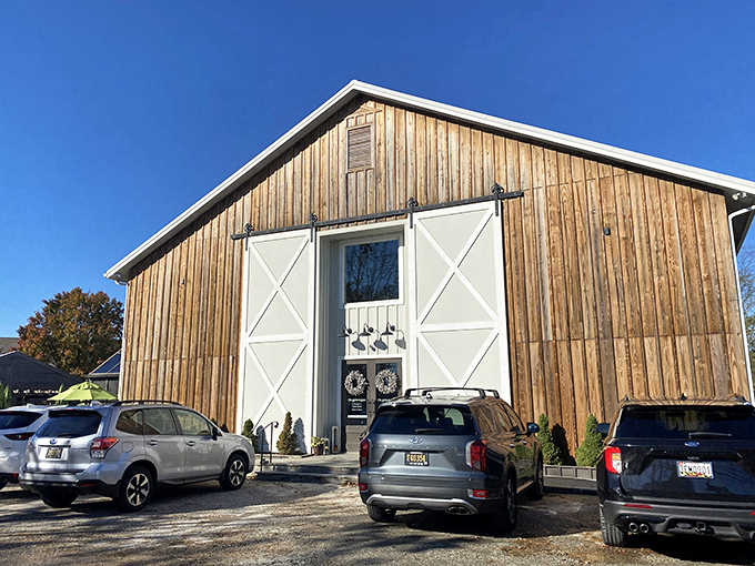 The barn-like exterior of The Station on Kings isn't just rustic chic—it's a culinary fortress guarding some of Delaware's most coveted cinnamon rolls.