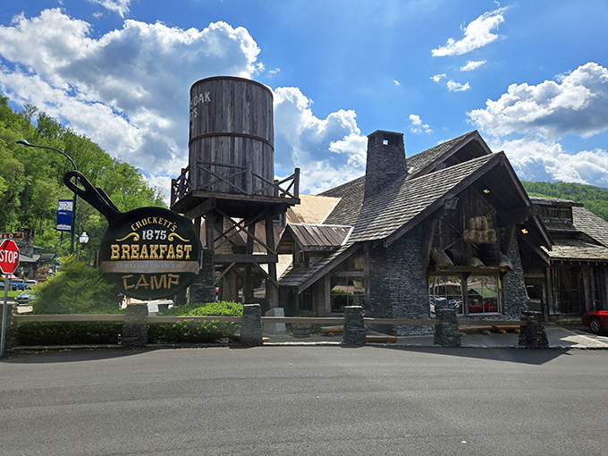 The frontier meets breakfast heaven! Crockett's iconic water tower and rustic log cabin exterior stand ready to transport hungry visitors back to Tennessee's pioneer days.
