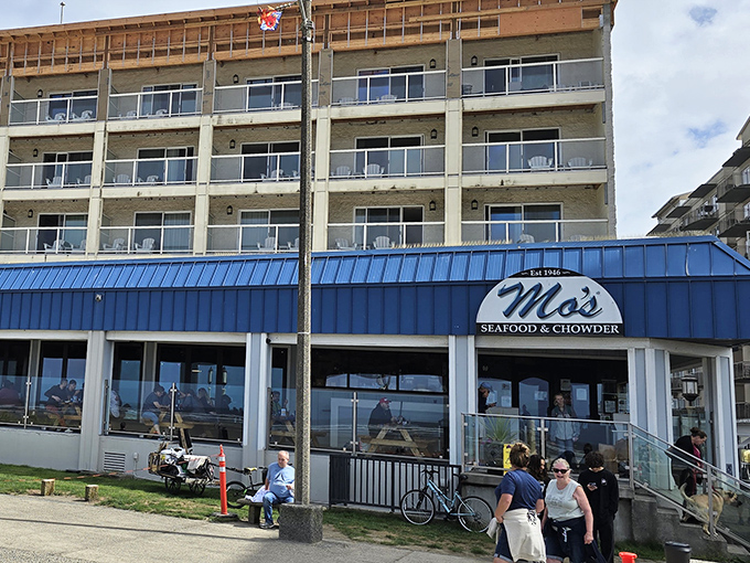 The iconic blue exterior of Mo's beckons seafood lovers like a maritime lighthouse, promising ocean-fresh delights with a side of Pacific views.