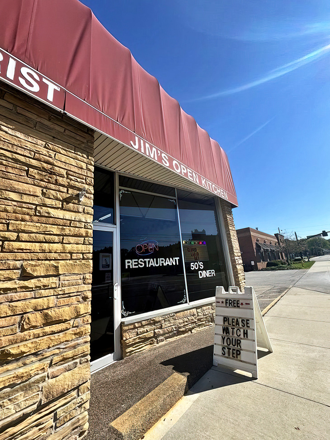 "PLEASE WATCH YOUR STEP" warns the sign, but the real danger at Jim's Open Kitchen is falling head over heels for their homestyle cooking and 1950s diner atmosphere.