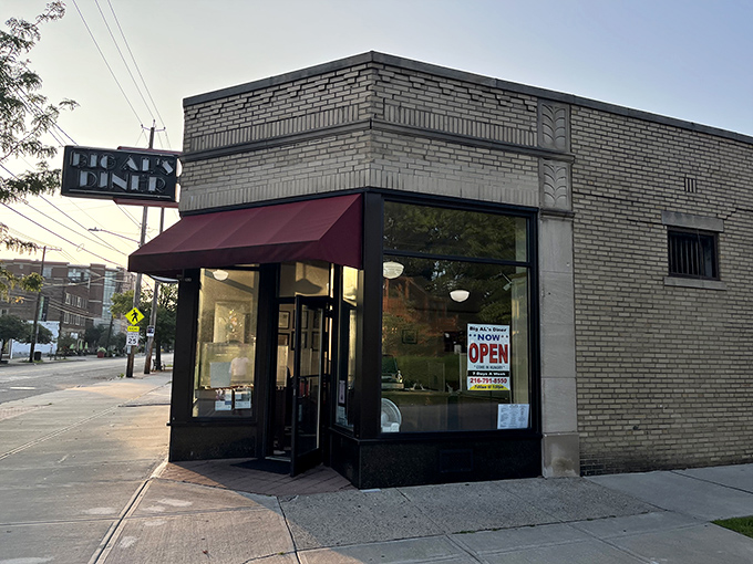 The unassuming brick exterior of Big Al's Diner stands like a time capsule on Larchmere Boulevard, its burgundy awning a beacon for breakfast enthusiasts.