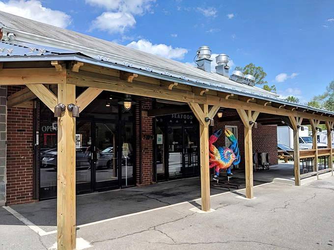 The unassuming brick exterior of Casey's Crab Company in Laurel might not scream "culinary destination," but seafood pilgrims know better. Those wooden posts have witnessed countless happy returns.