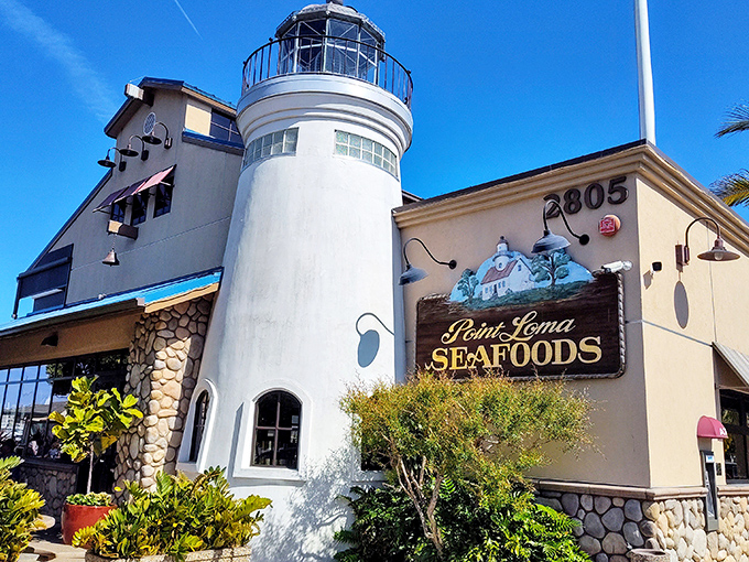 The lighthouse-shaped entrance isn't just architectural whimsy&mdash;it's a beacon calling seafood lovers home to this San Diego institution.
