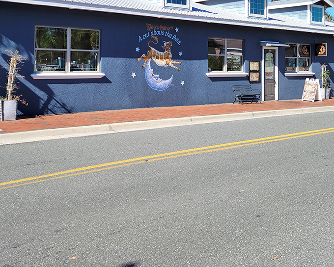 The blue exterior with its whimsical cow-jumping-over-the-moon mural promises a dining experience that's truly "a cut above the rest."